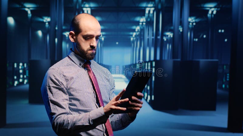 Data Center it Engineer Standing in Server Room Stock Image - Image of ...