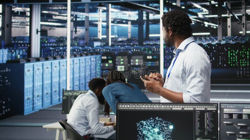 Data Center Engineer Using Tablet To Interpret AI Generated Data Analytics Graphs Stock Video ...