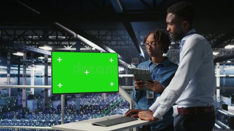 Data Center Engineering Team Coding on Green Screen PC, Monitoring AI Systems Stock Video ...