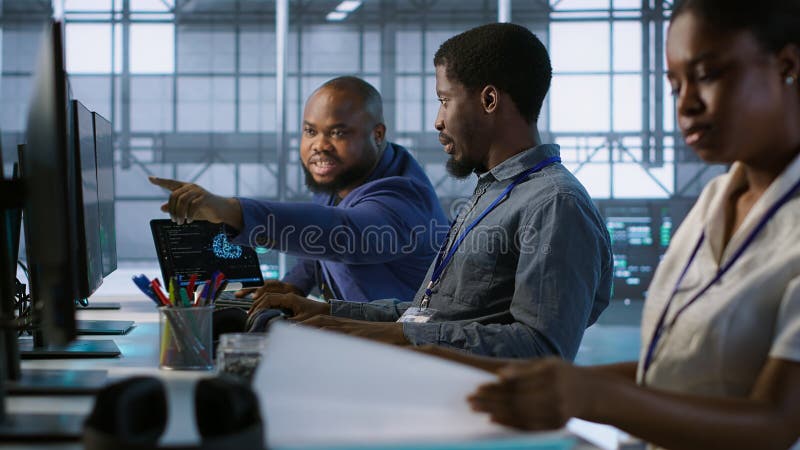 Data Center Engineers Maintaining Company Network Infrastructure Stock ... Data Center Engineers Maintaining Company Network Infrastructure Stock ...