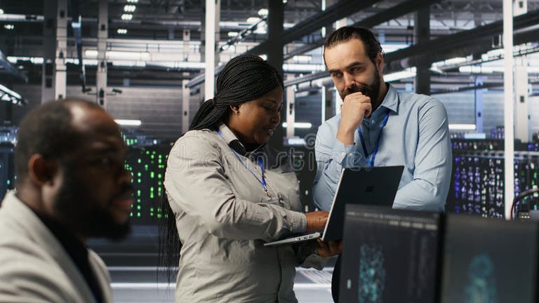 Data Center Engineers Performing Maintenance on Servers Used for AI ...