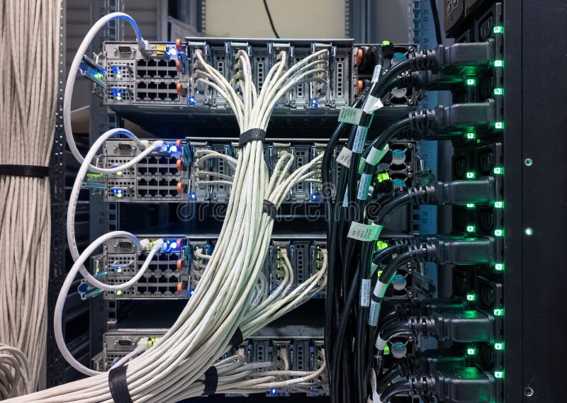 Data Center Equipment with Organized Cabling and Illuminated Ports ...
