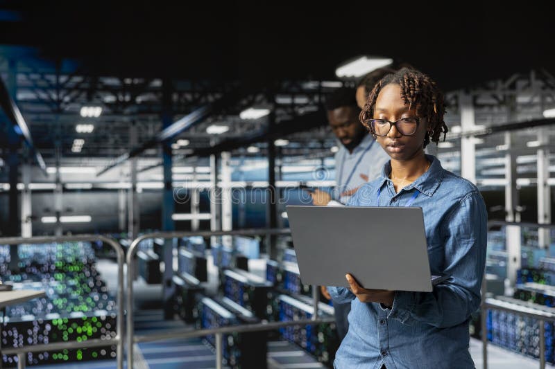Data Center Female System Administrator Performing Maintenance Stock Photo - Image of employee ...