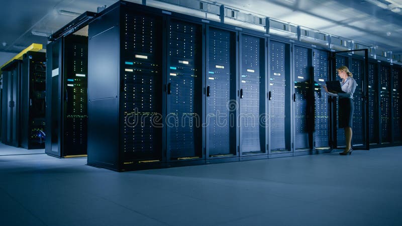 In Data Center: Female it Technician Stands before Open Server Rack ...