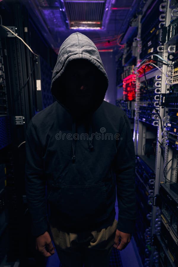 Data Center Intruder among Racks with Computer Equipment Stock Image ...