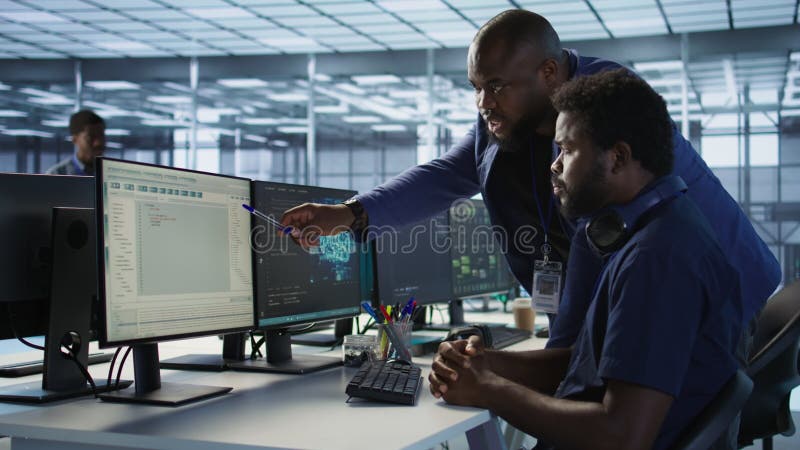 Data Center Manager Helps Intern Implement AI Predictive Systems Stock ...