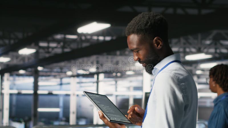 Data Center Programmer Checking Lines of Code Next To Colleague Stock ...