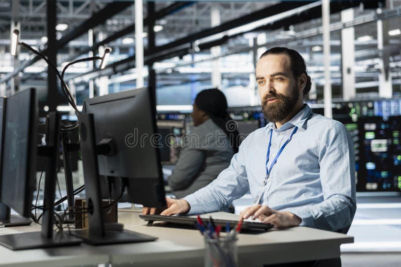 Data Center Programmer Using PC To Update Servers Tech, Configuring ...