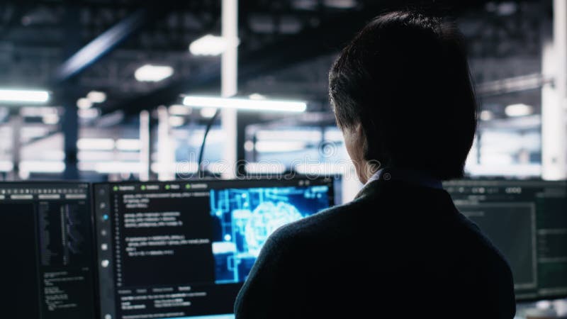 Data Center Software Developer Using Computer To Monitor Neural Network AI LLM Stock Footage ...