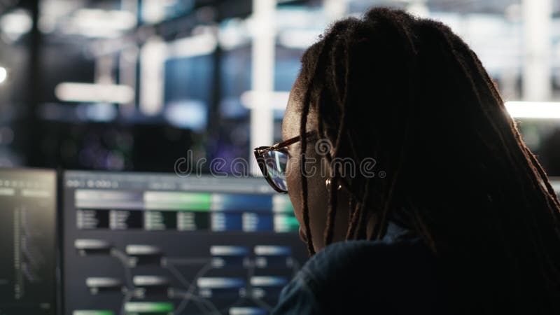 Data Center System Administrator Using Algorithms To Analyze Large Datasets Stock Video - Video ...