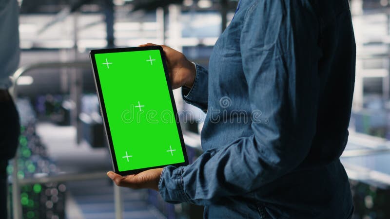 Data Center Worker Using Green Screen Mockup Tablet, Doing Maintenance ...