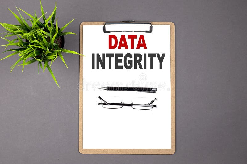 DATA INTEGRITY on the Brown Clipboard on the Grey Background. Business ...