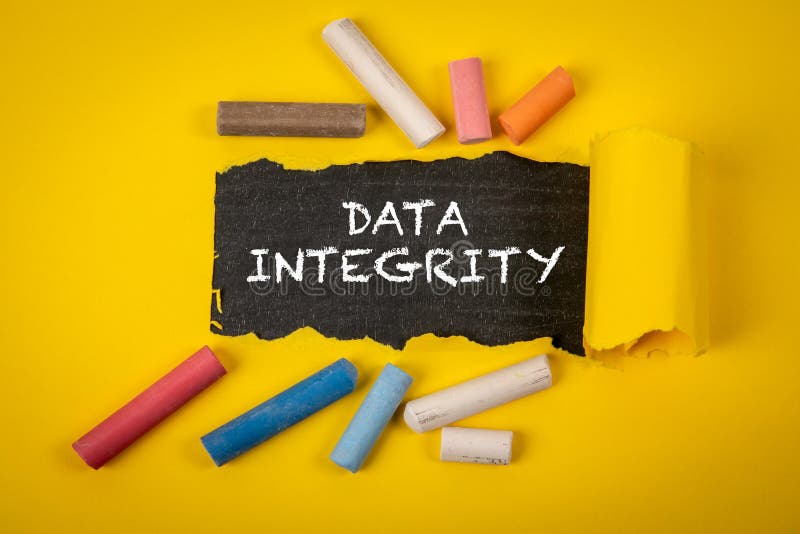 Data Integrity. Text Under Torn Yellow Paper on a Blackboard Stock ...