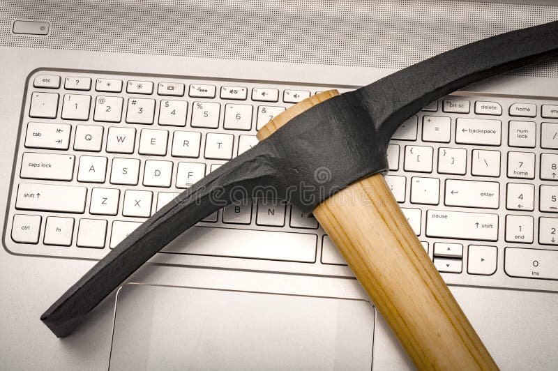 Data Mining Concept With A Pickaxe On A Computer Keyboard Data Mining Is The Computing Process