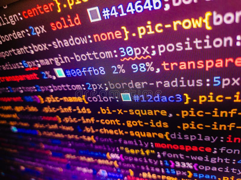 Computer Script Typing Work. Programmer Typing New Lines of HTML Code. Closeup of Java Script ...
