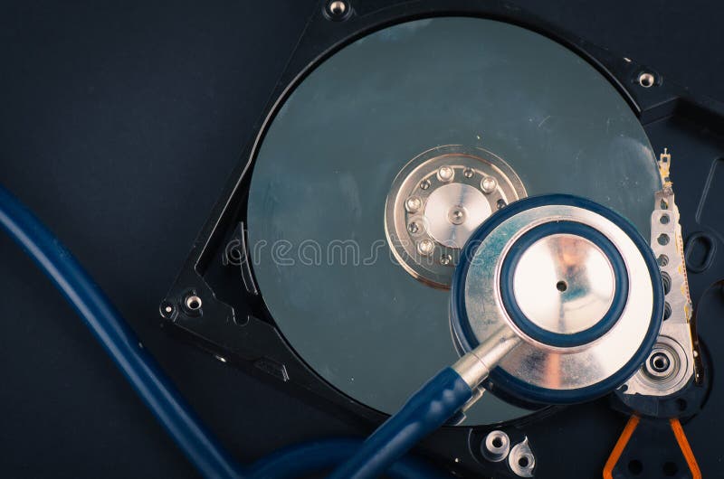 Stethoscope on Dusty Dismantle Hard Disk Over Dark Background Stock ...