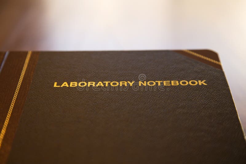 Data and Research Laboratory Notebook on Wood Table Stock Photo - Image ...