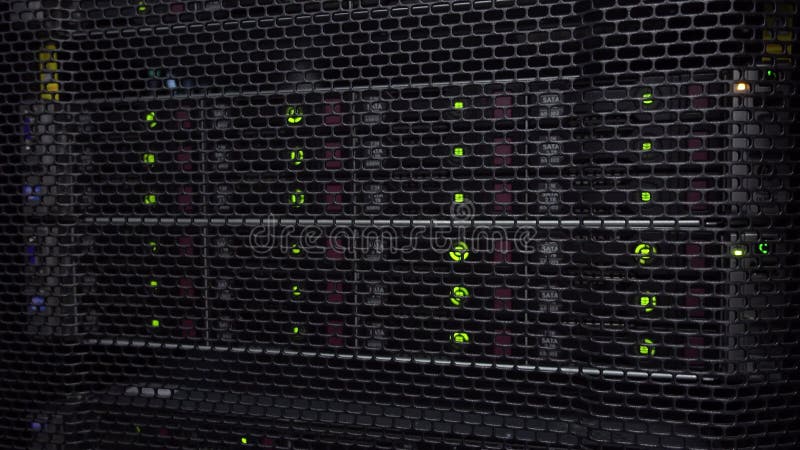 Data Servers Rack with Many Hard Drives and LED Lamps Flashes. Storage ...