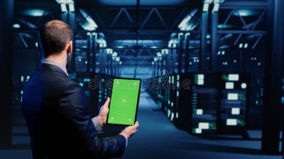 Database Admin Analyzing Greenscreen Display on Tablet Stock Image ...