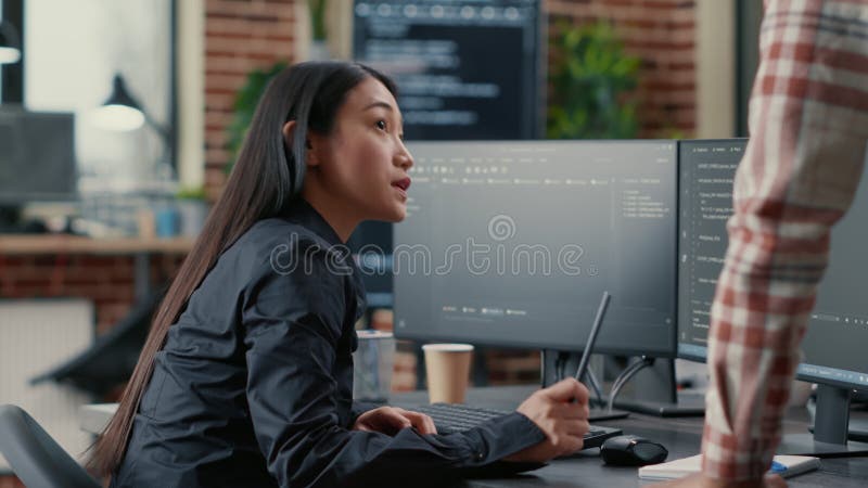 Programer Pointing Pencil At Computer Screen With Software Compiling Code Explaining Source