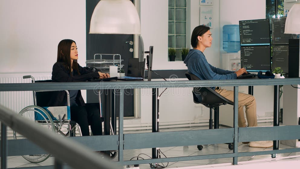 Database Programer with Physical Disability Writing Code on Computer Screen Stock Photo - Image ...