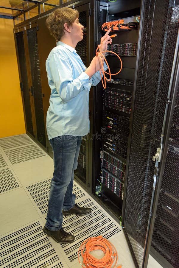 Datacenter Professional in Server Room Stock Photo - Image of hardware ...