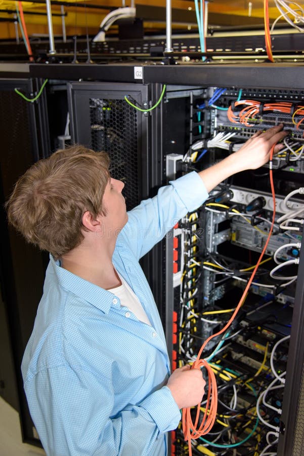 Datacenter Technician Patching Optical Cable Stock Photo - Image of ...