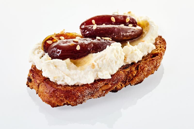 Date and Sesame Canape on Quark Cheese Stock Image - Image of cocktails ...