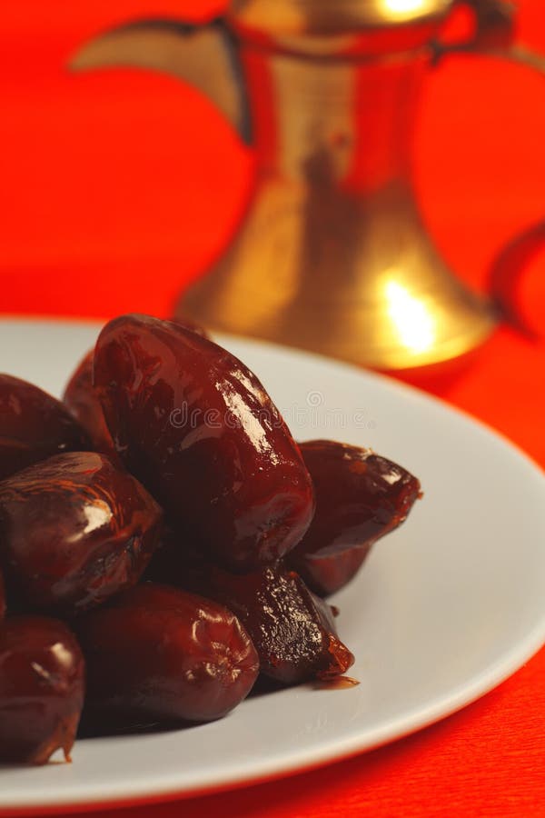 Dates bowl and rosary stock image. Image of religious - 20567309