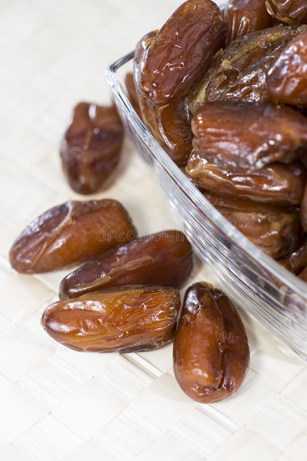 Dates in a bowl stock image. Image of organic, arabia - 39406055