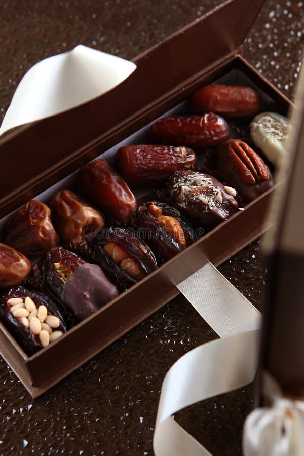 Dates in Chocolate. the Dates are in a Box. Food in Ramadan. Oriental ...