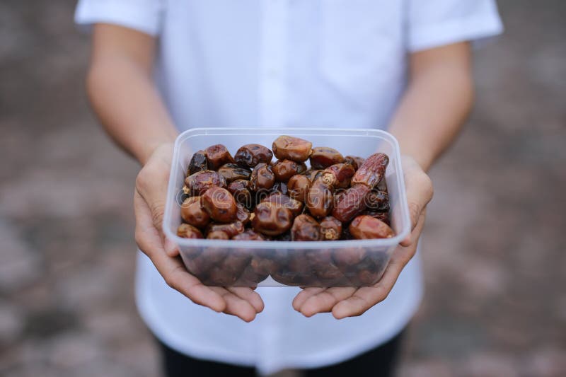 Dates in a Container stock photo. Image of suhoor, flower - 359840764