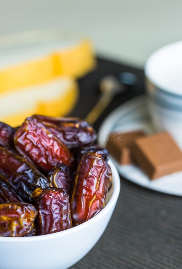 Dates fruit in small bowl stock photo. Image of culture - 119837726