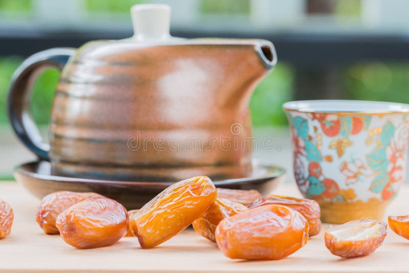 Dates fruit with tea cup stock photo. Image of natural - 60671438
