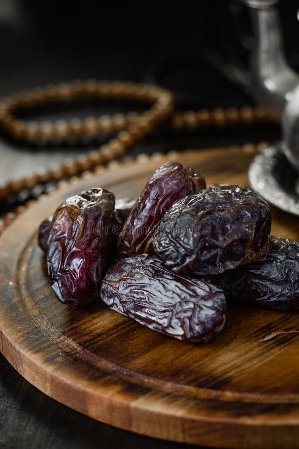 Dates for Iftar on Wooden Board for Ramadan Month. Stock Image - Image ...