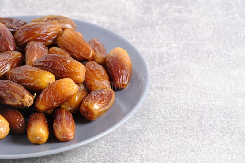 Red Dates with a Plate on the White Background Stock Image - Image of ...