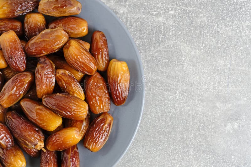 Dates Plate Gray Background.Edible Fruits Date Palm. Stock Photo ...