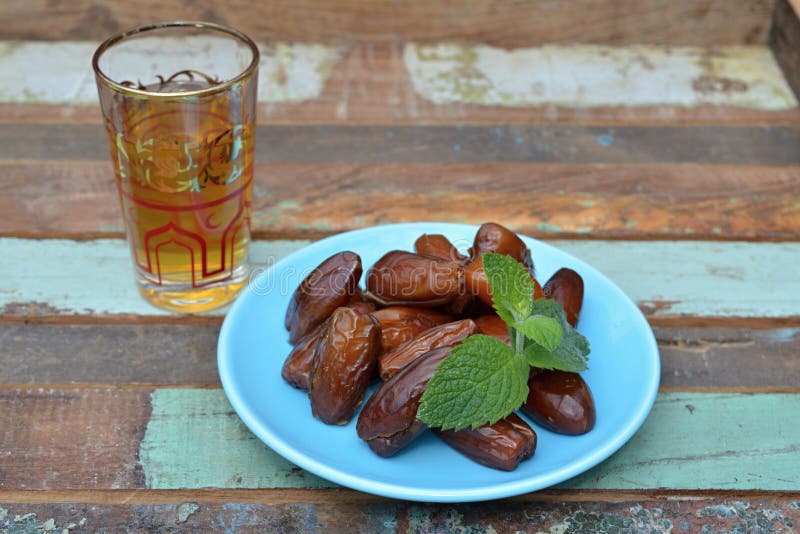 Dates and tea stock image. Image of food, moroccan, plate - 73203441