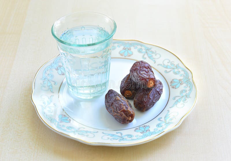 Dates and water stock photo. Image of east, fruit, arabic - 41640698