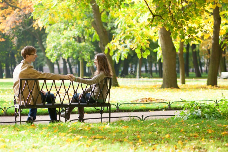 Couple on a bench stock image. Image of park, touching - 205633