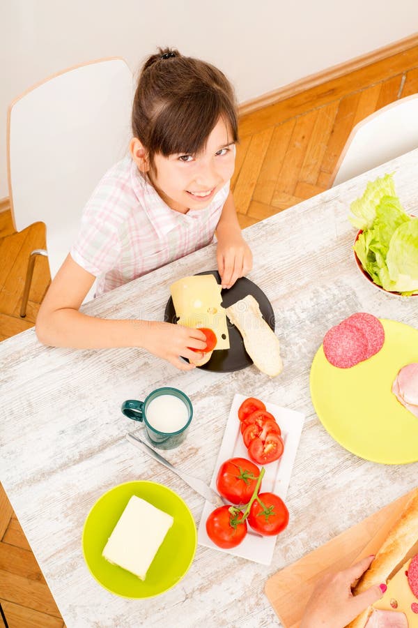Daughter eating at home stock image. Image of kitchen - 74149843