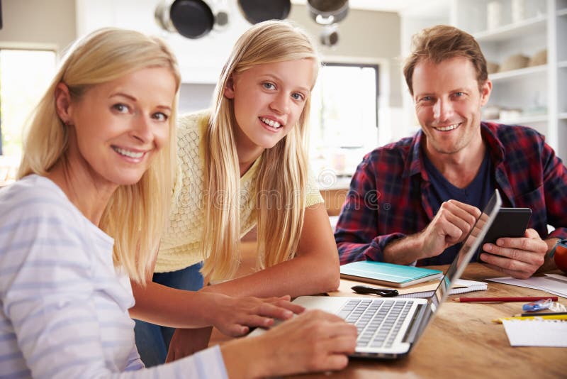 Daughter Helping Her Parents with New Technology Stock Image - Image of ...