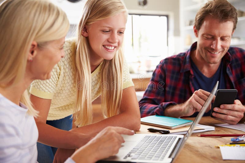 Daughter Helping Her Parents with New Technology Stock Image - Image of ...