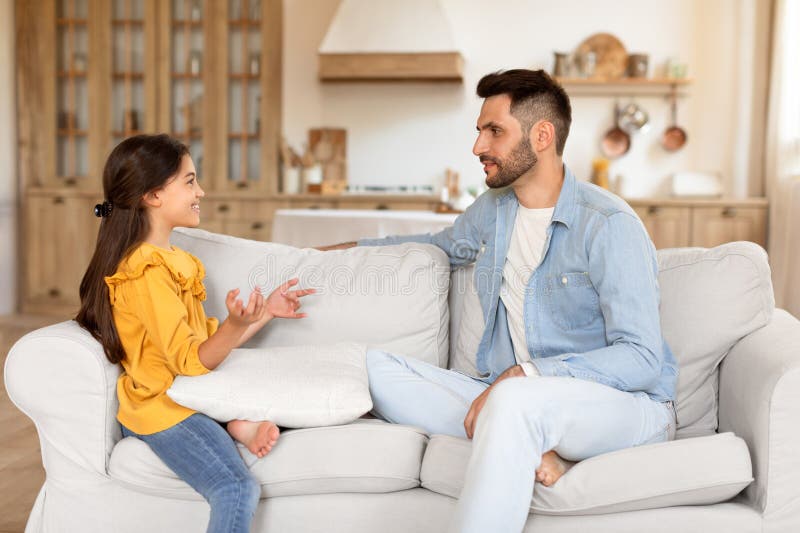 Daughter Smiling and Talking To Dad Bonding at Home Stock Image - Image ...