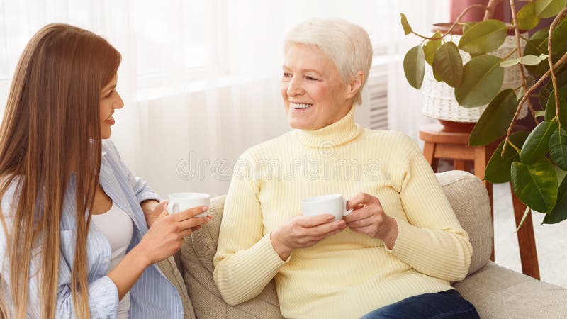 Daughter Visiting Her Mother, Drinking Coffee and Talking Stock Image ...