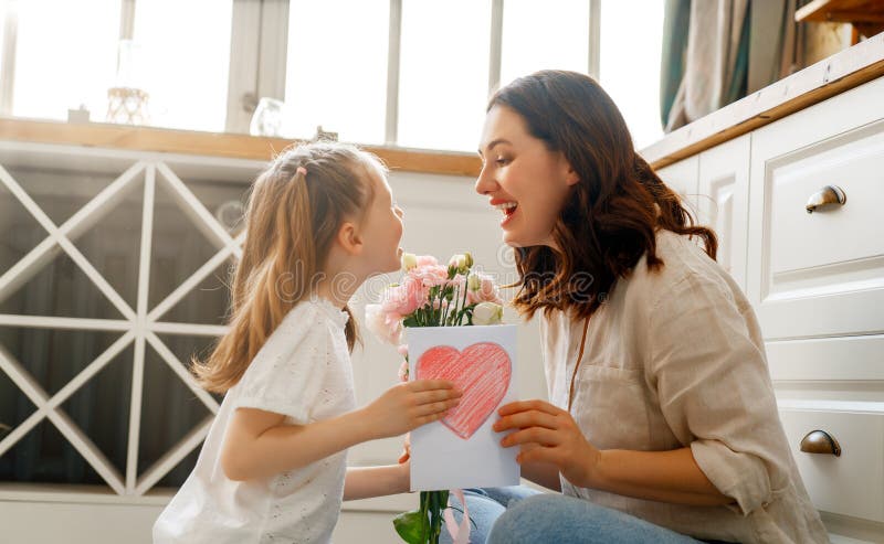 Daughter Giving Mother Bouquet of Flowers Stock Photo - Image of ...