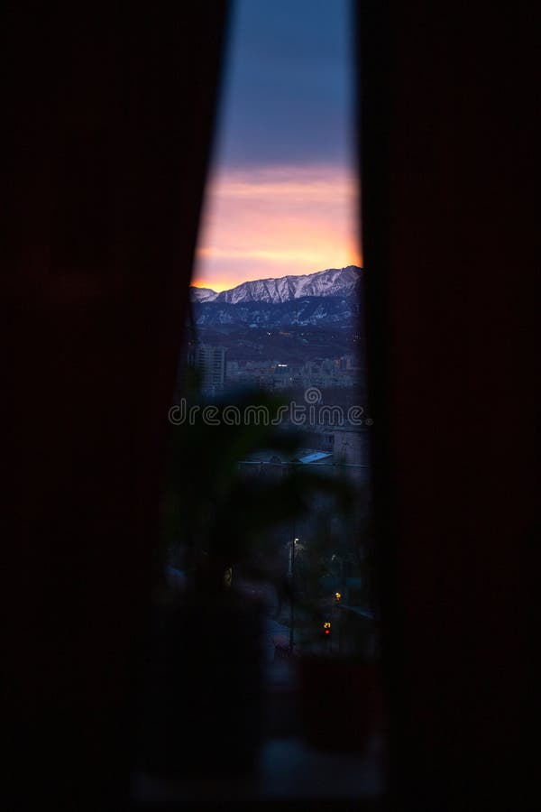 Dawn on the Background of Mountains. View from the Window Stock Photo ...