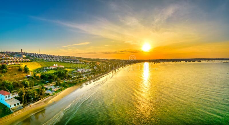 Dawn on the Beach with Tilted Coconut Trees, Long Sandy Beach Stock ...