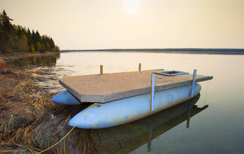 Dawn boat stock image. Image of reflection, lake, brown - 73314821