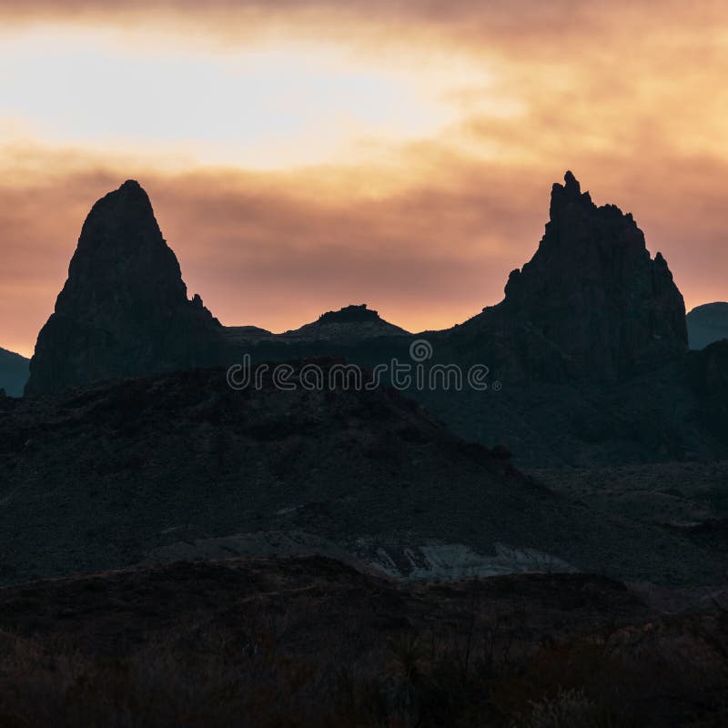 Dawn Breaks Over Mule Ears Formation in Big Bend Stock Photo - Image of ...